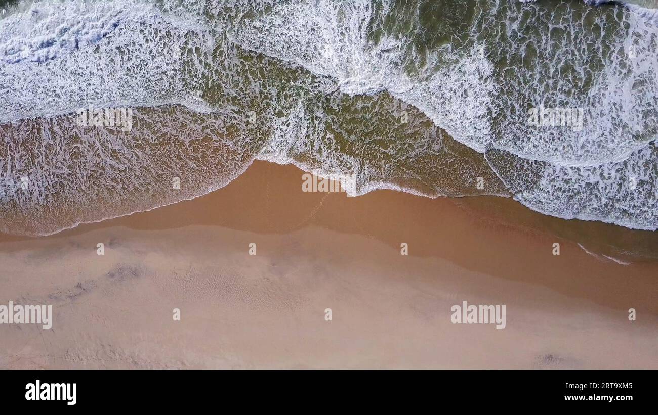 Aerial 4k above crashing waves hi-res stock photography and images - Alamy