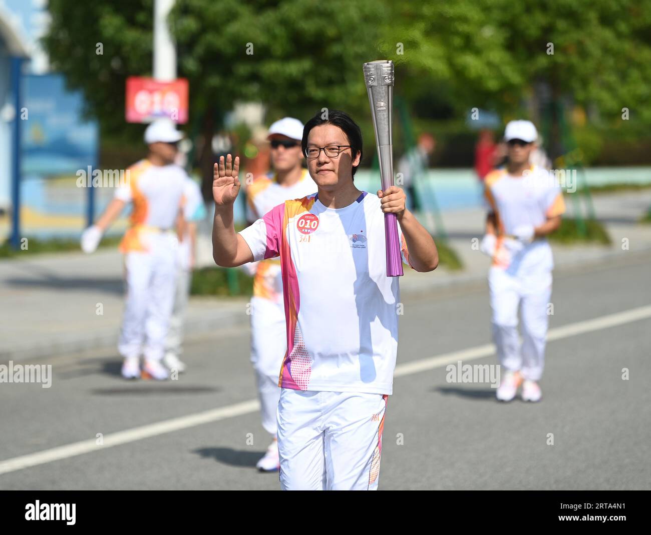 Ningbo, China's Zhejiang Province. 12th Sep, 2023. Torch bearer Xie ...
