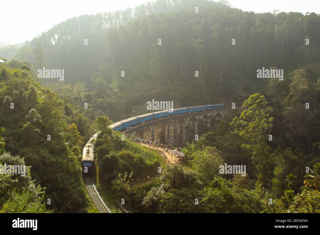 Train crosses Demodara nine arch bridge. Sri Lanka. Aerial background ...
