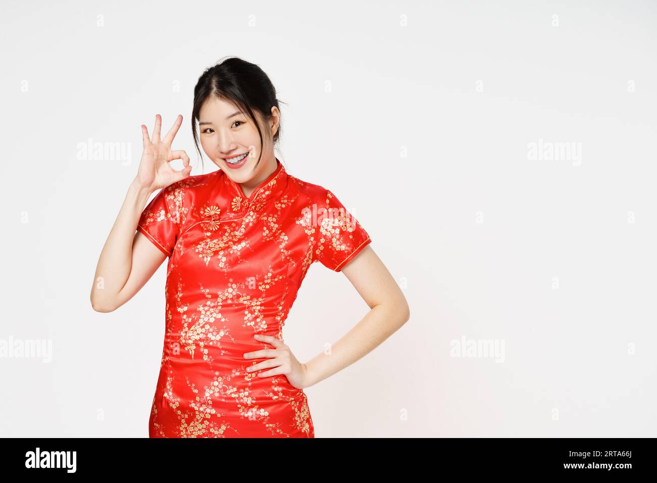 Happy Chinese new year. Asian woman wearing traditional cheongsam qipao ...