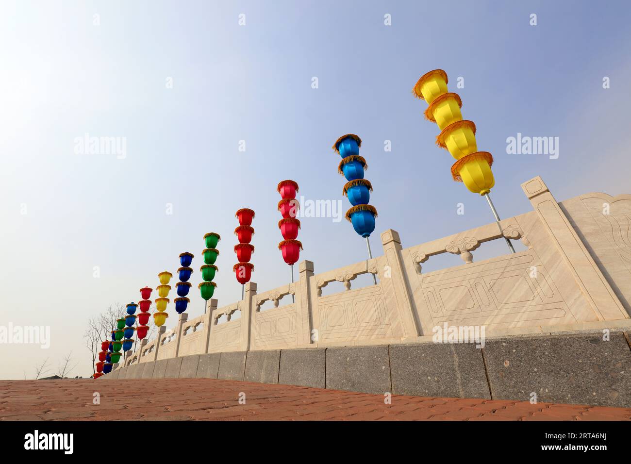 Stone bridge railing and lantern Stock Photo - Alamy