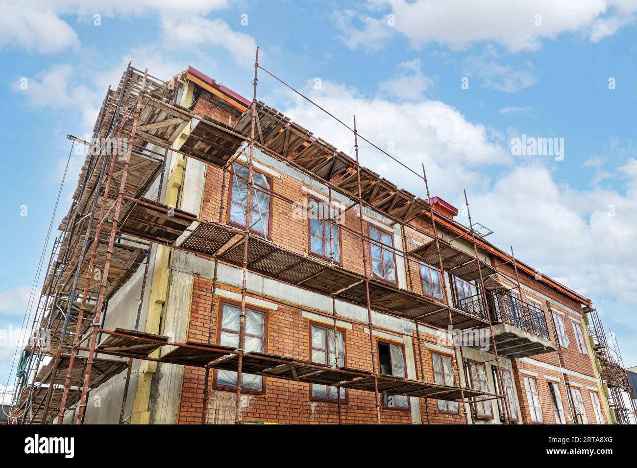 scaffolding around the building under reconstruction. bottom view Stock ...