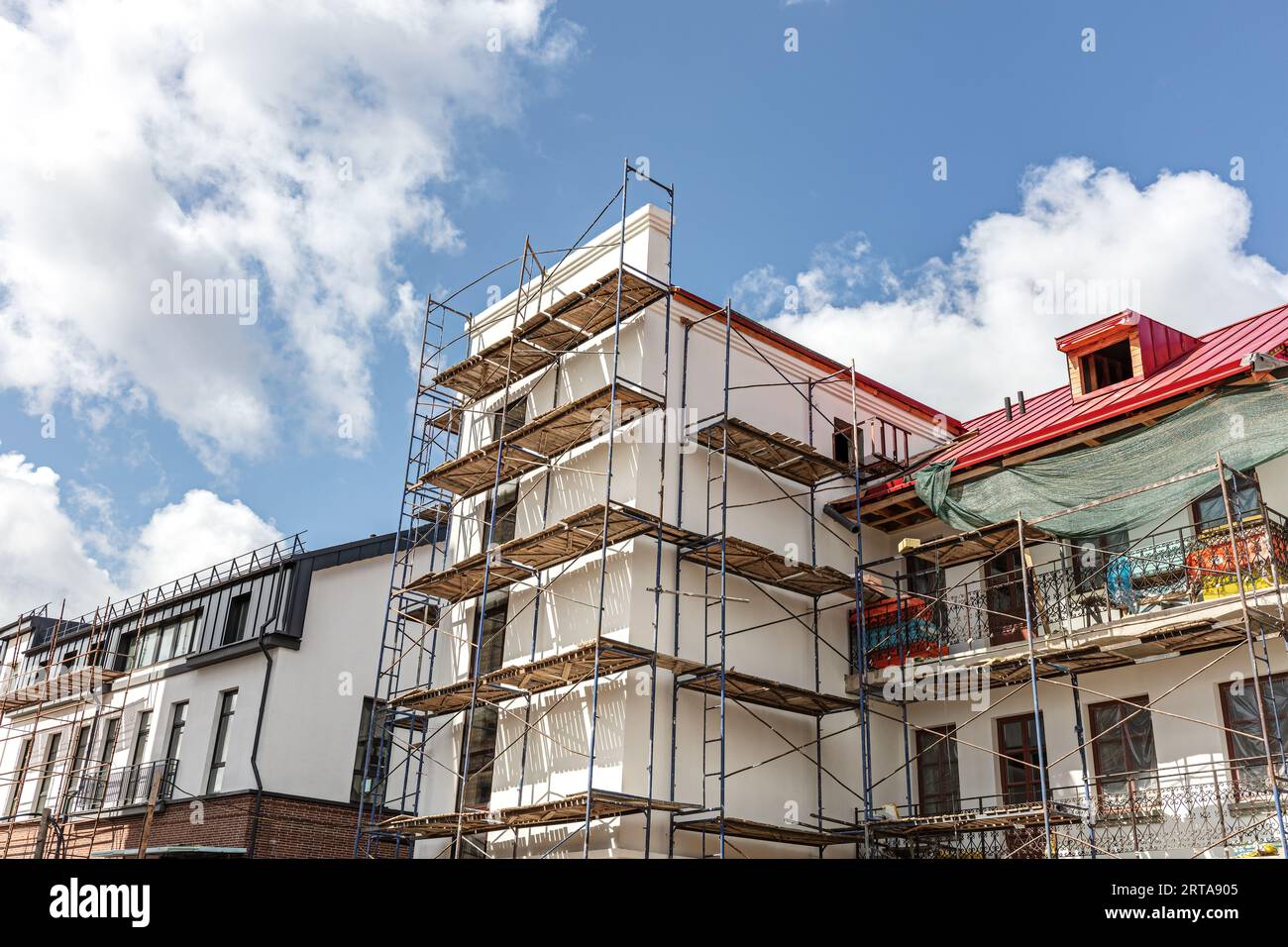 refurbishment of old buildings. scaffolding around a building facade ...