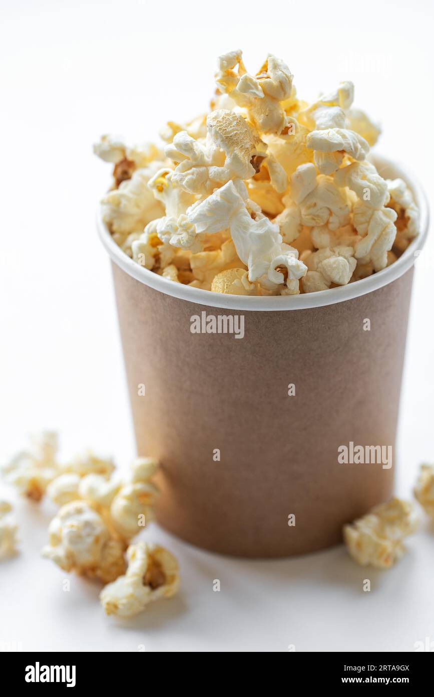 Popcorn paper bucket on white background Stock Photo - Alamy