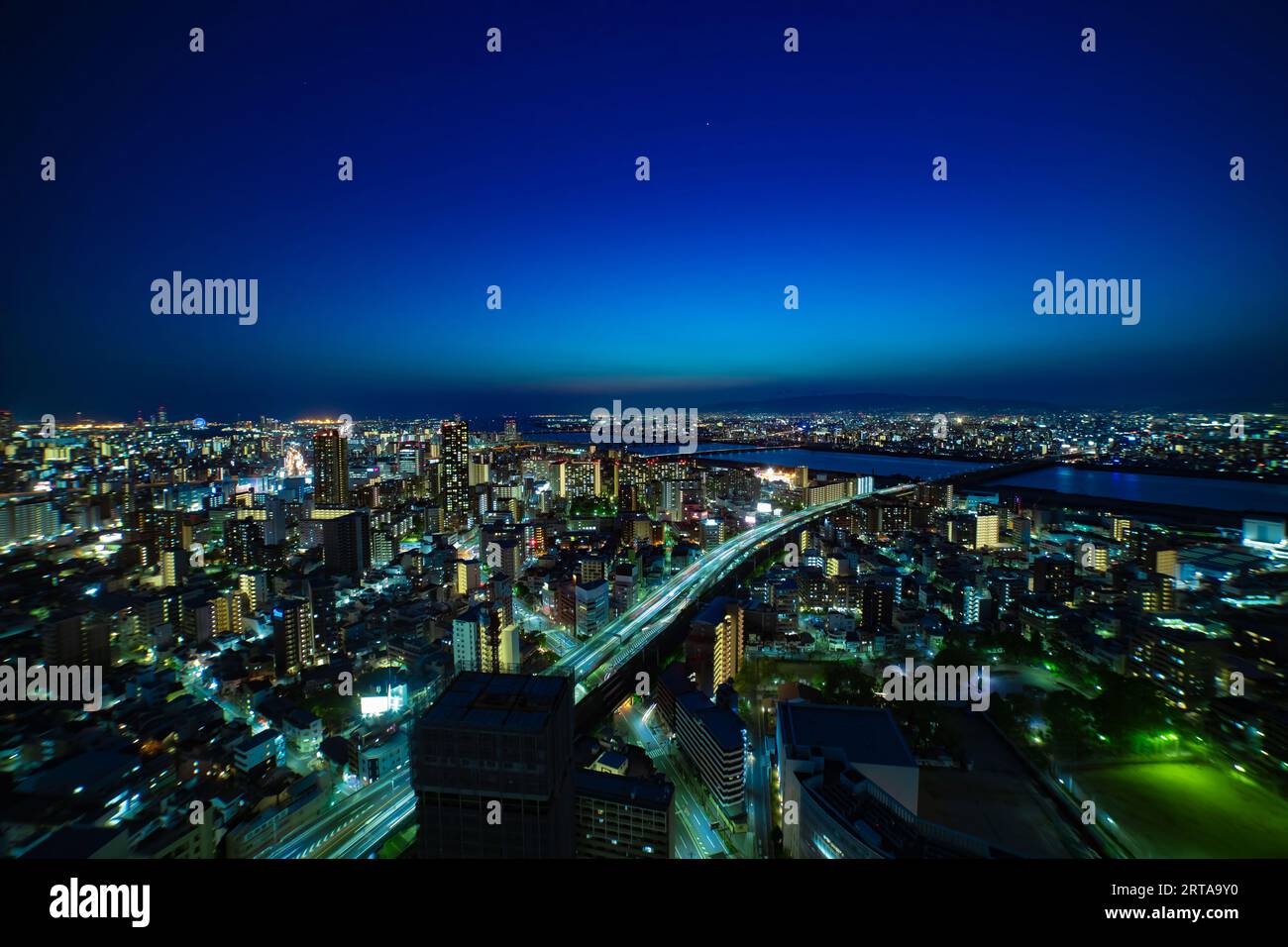 A night panoramic cityscape near Yodo river in Osaka wide shot Stock ...