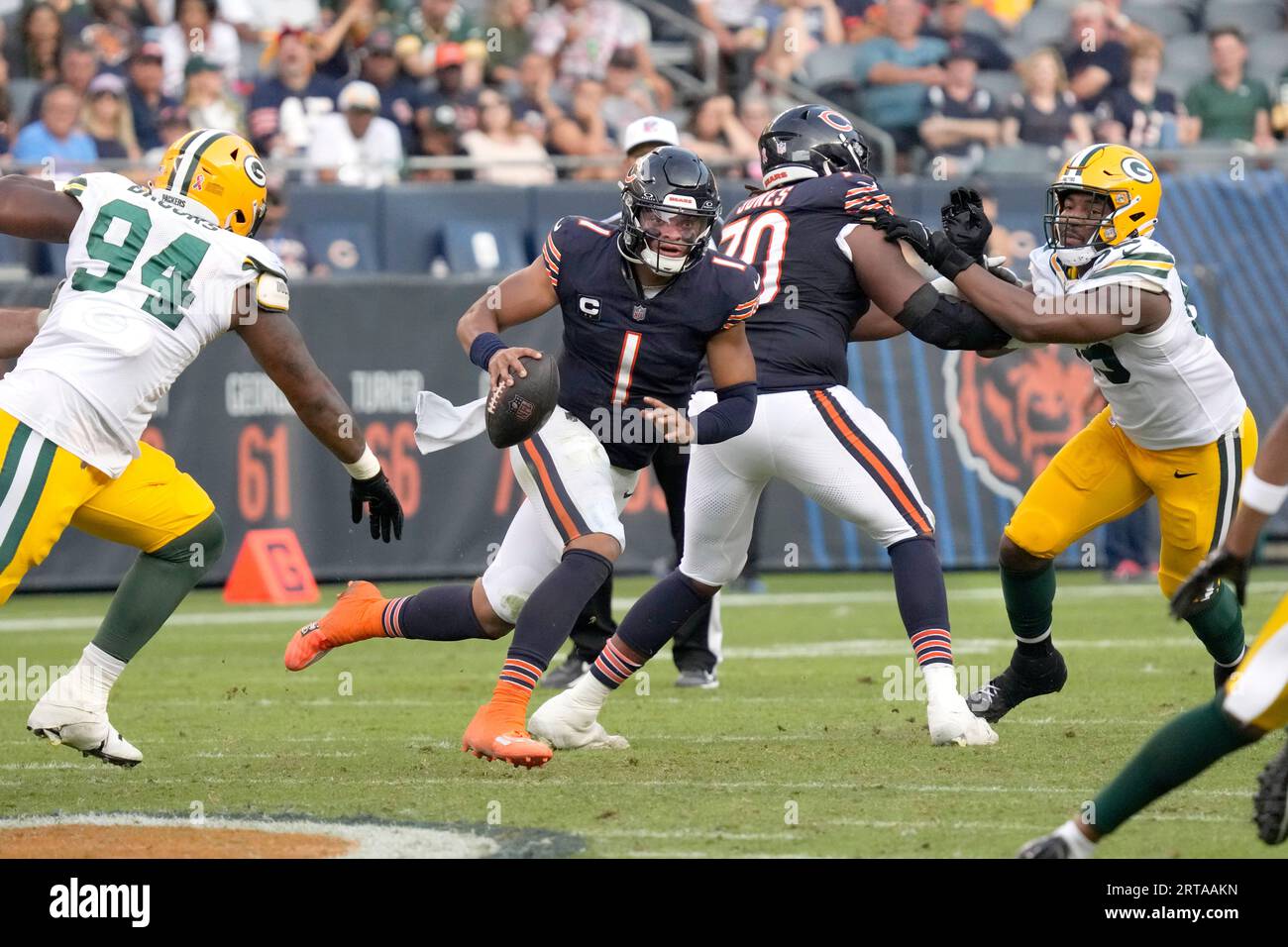 Chicago Bears quarterback Justin Fields scrambles during an NFL ...