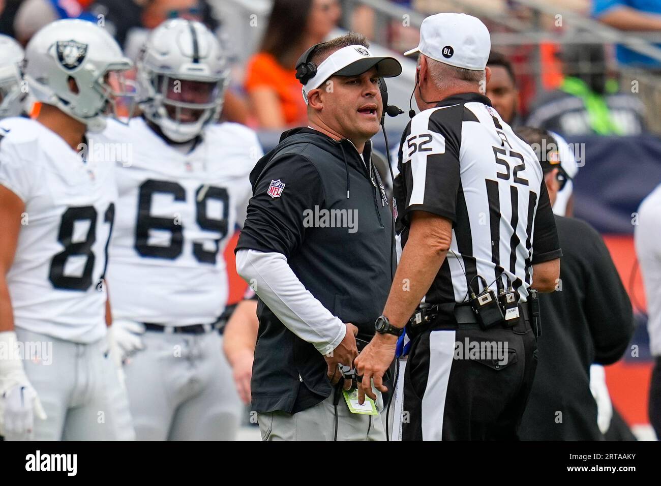 Las Vegas Raiders head coach Josh McDaniels talks with referee Bill ...