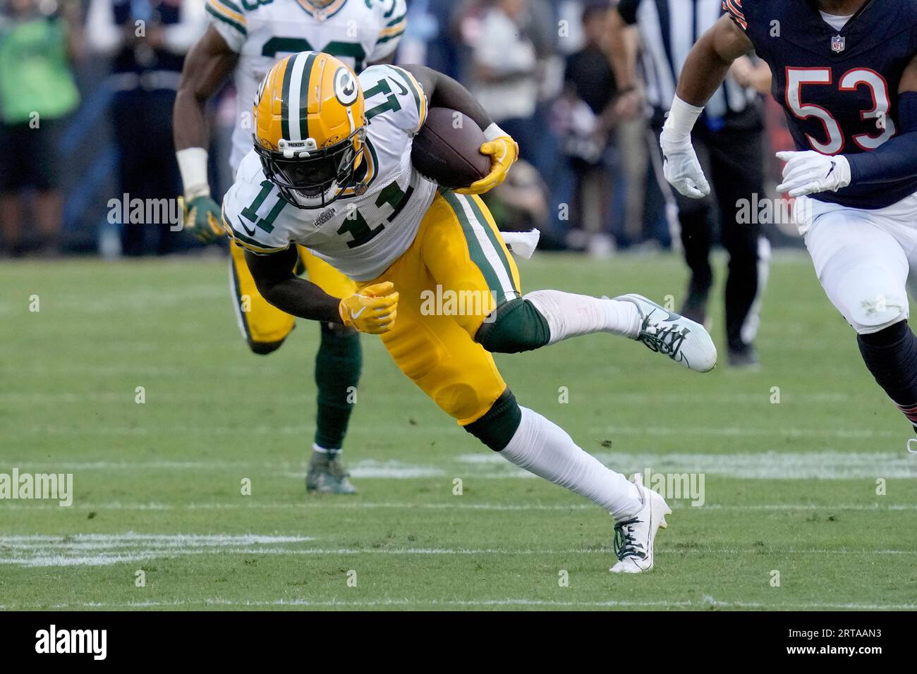 Green Bay Packers wide receiver Jayden Reed carries the ball after a ...