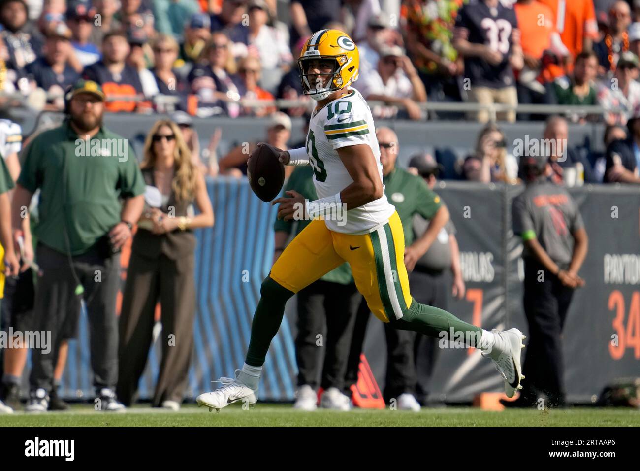 Green Bay Packers quarterback Jordan Love scrambles during an NFL ...