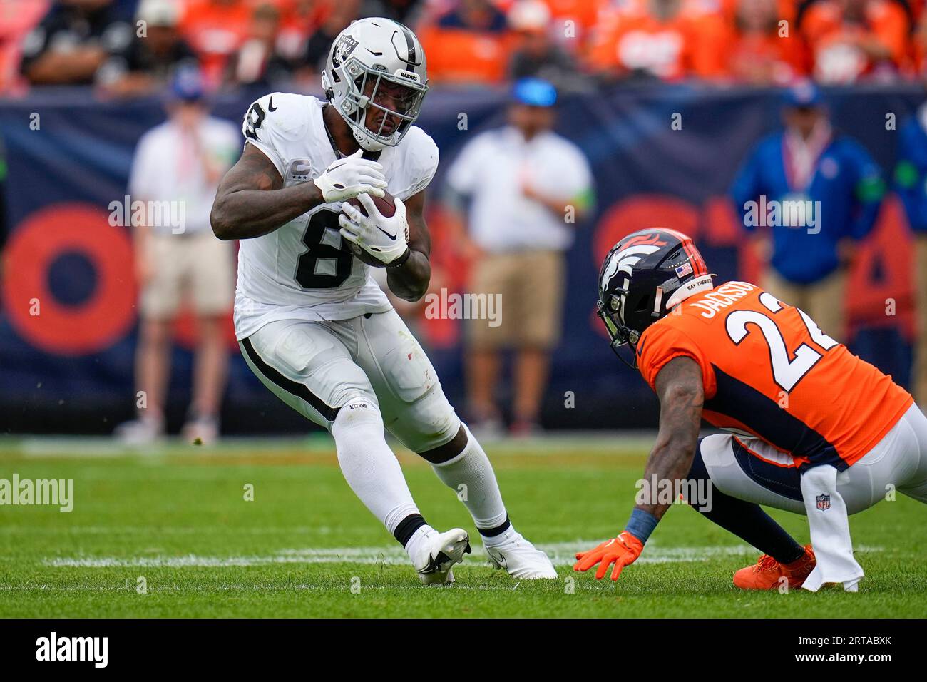 Las Vegas Raiders running back Josh Jacobs (8) rushes against the ...