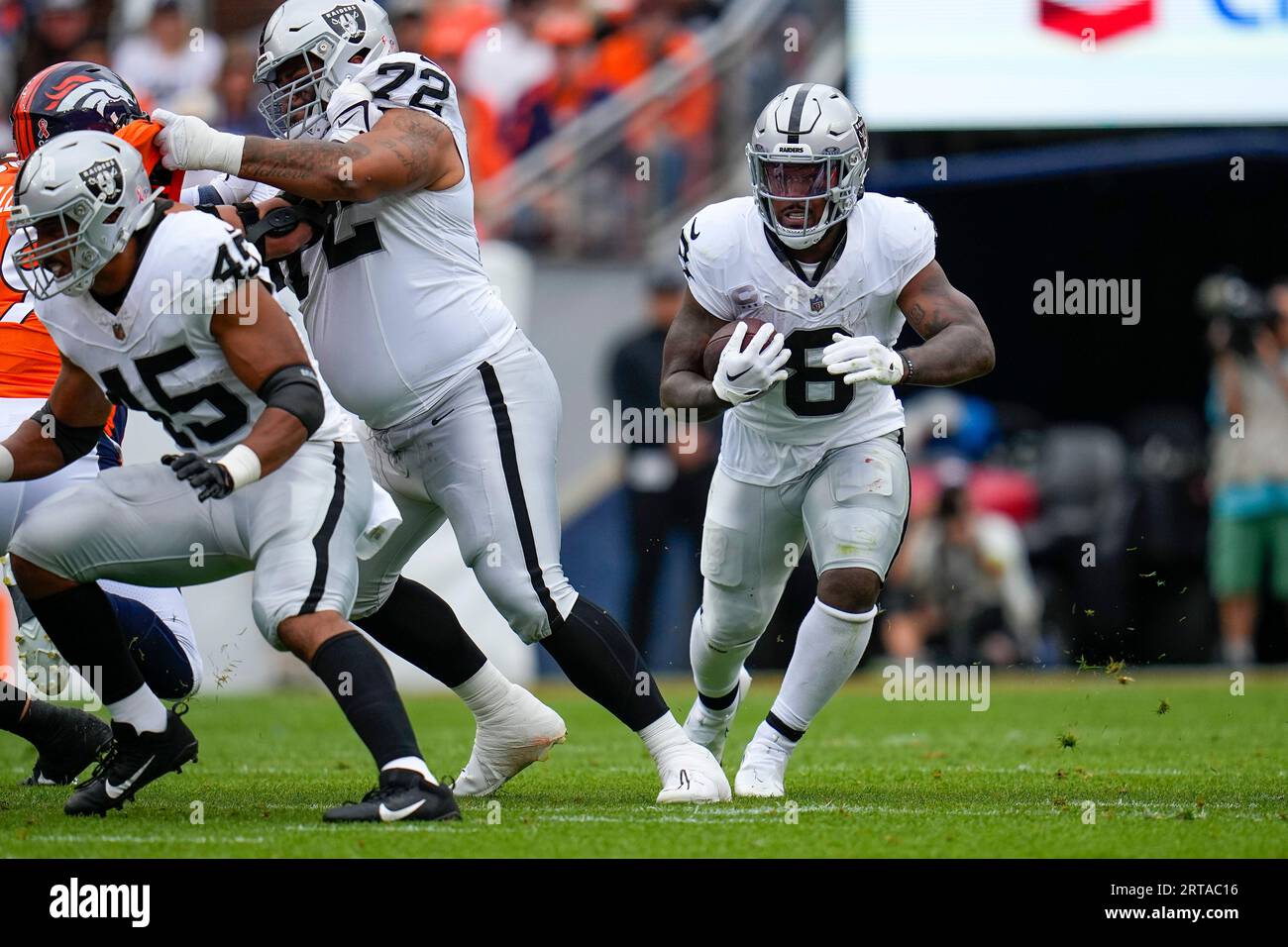 Las Vegas Raiders running back Josh Jacobs (8) rushes against the ...