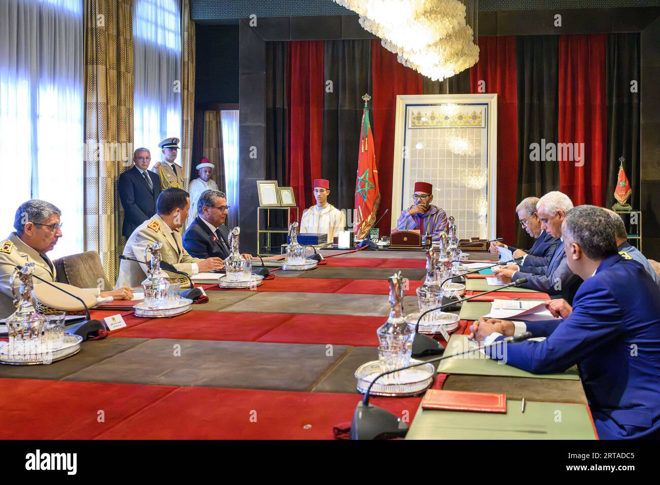 Rabat, Morocco. 09th Sep, 2023. Morocco's King Mohammed VI (center) accompanied by his son Crown ...
