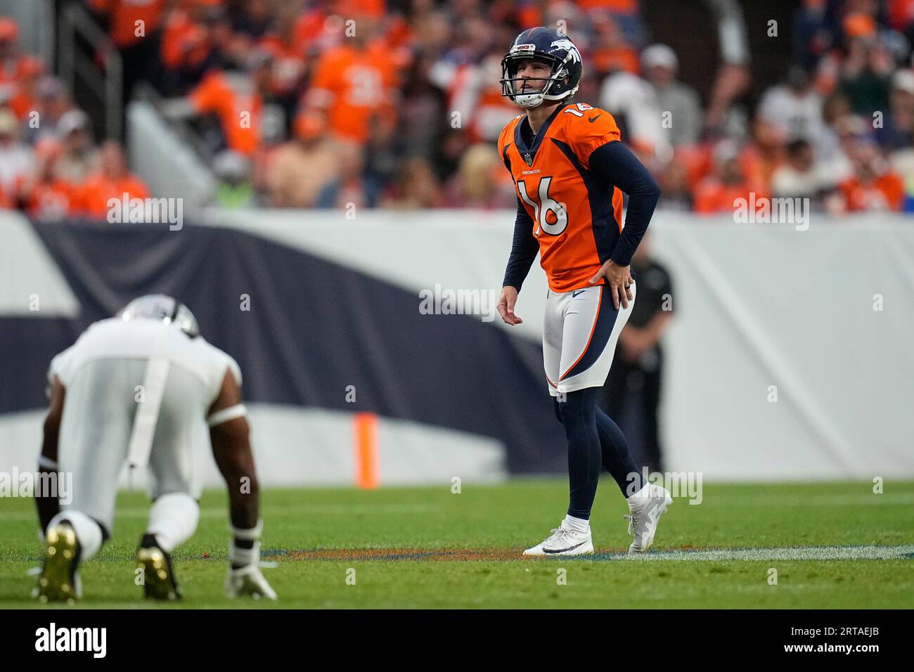 Denver Broncos place kicker Wil Lutz (16) gets ready to attempt a field ...