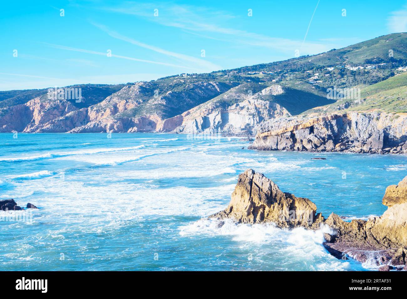 Pictorial view of blue lagoon, rocky beach seashore coastline, foamy ...