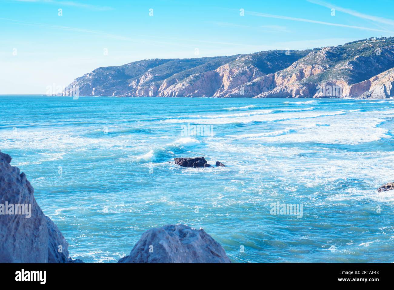 Spectacular view of blue lagoon, rocky ravine seashore coastline, foamy ...