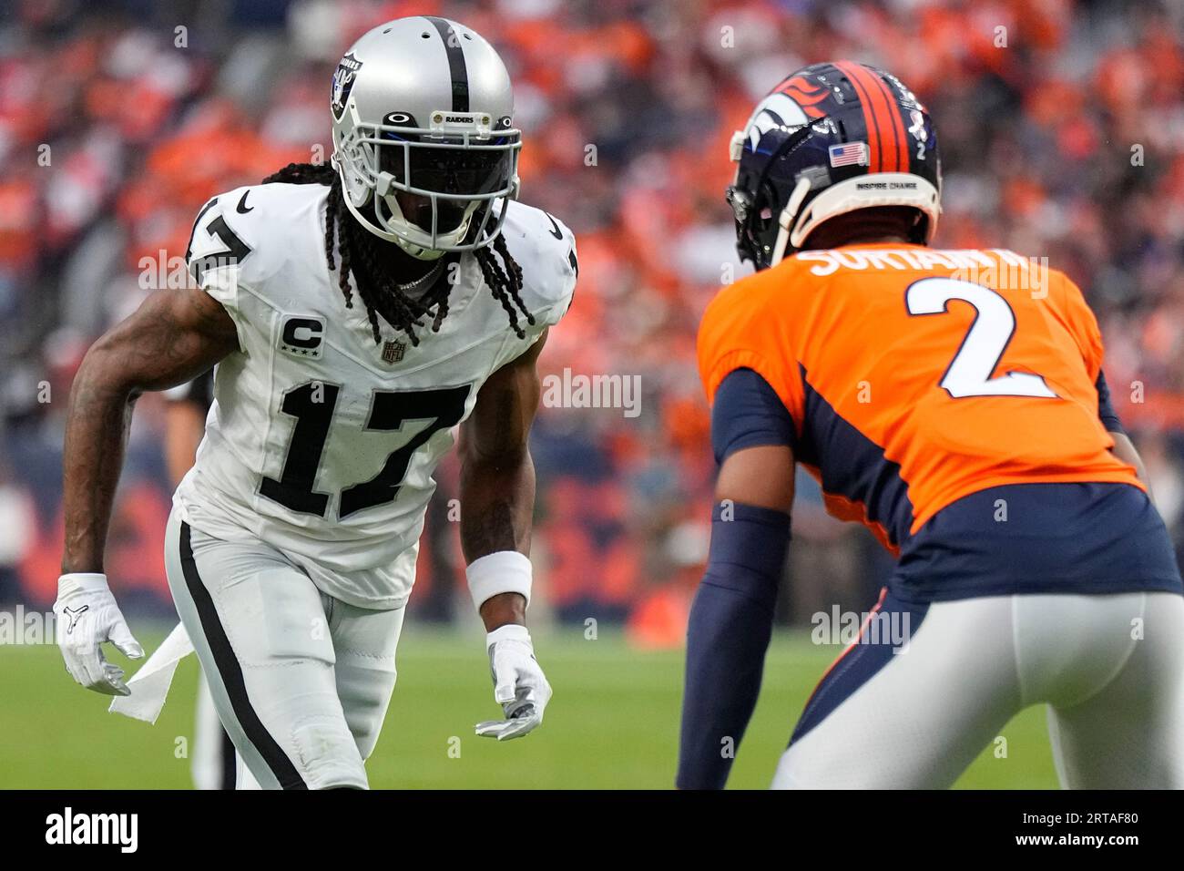 Las Vegas Raiders wide receiver Davante Adams (17) lines up against Denver Broncos cornerback ...
