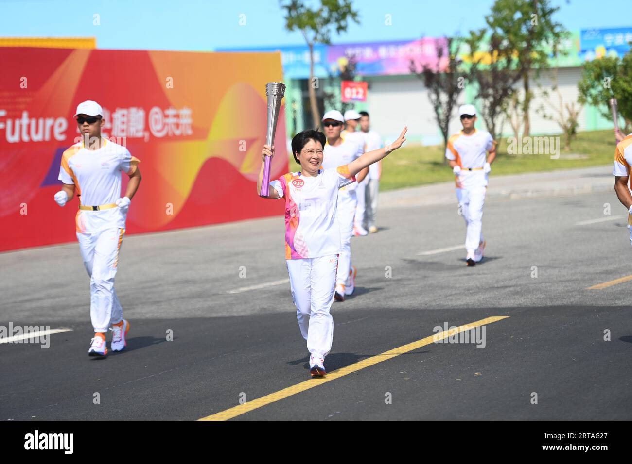 Ningbo, China's Zhejiang Province. 12th Sep, 2023. Torch bearer Zhang ...