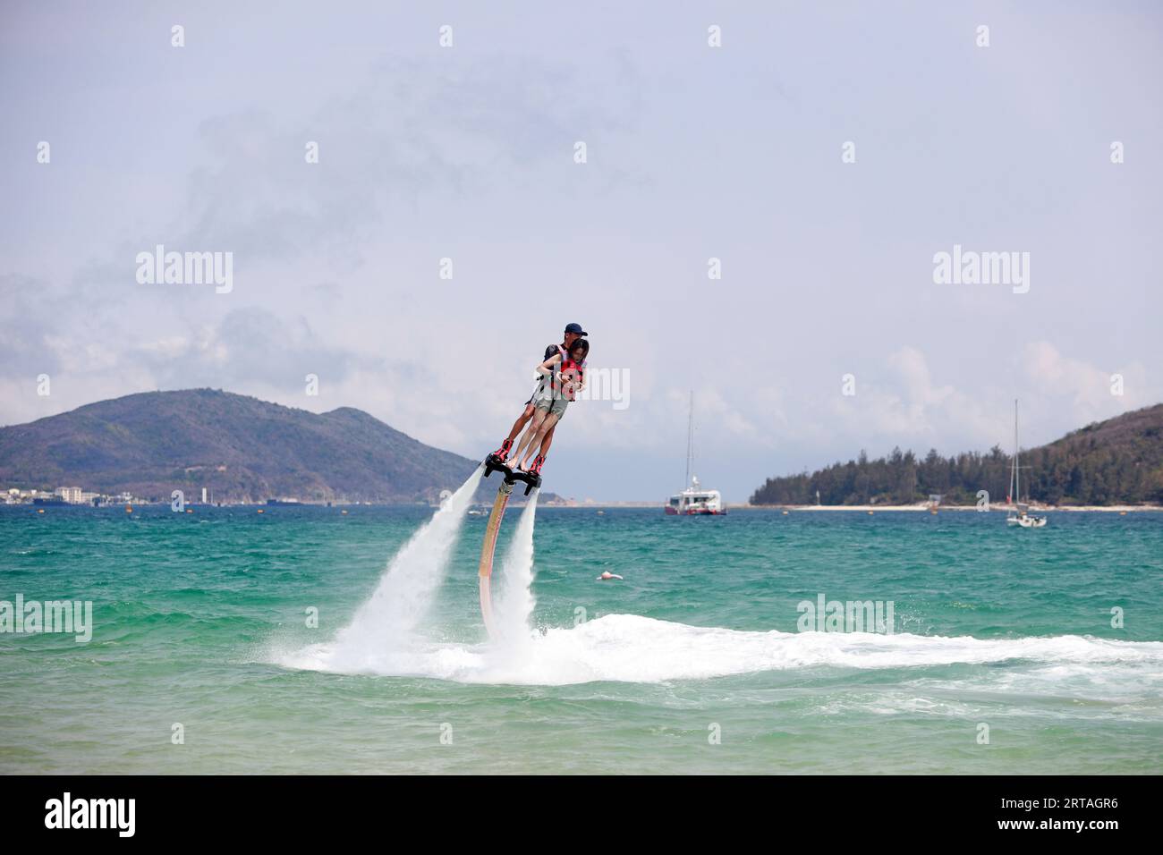 Sanya City, China - April 1, 2019: Water flying man amusement project ...