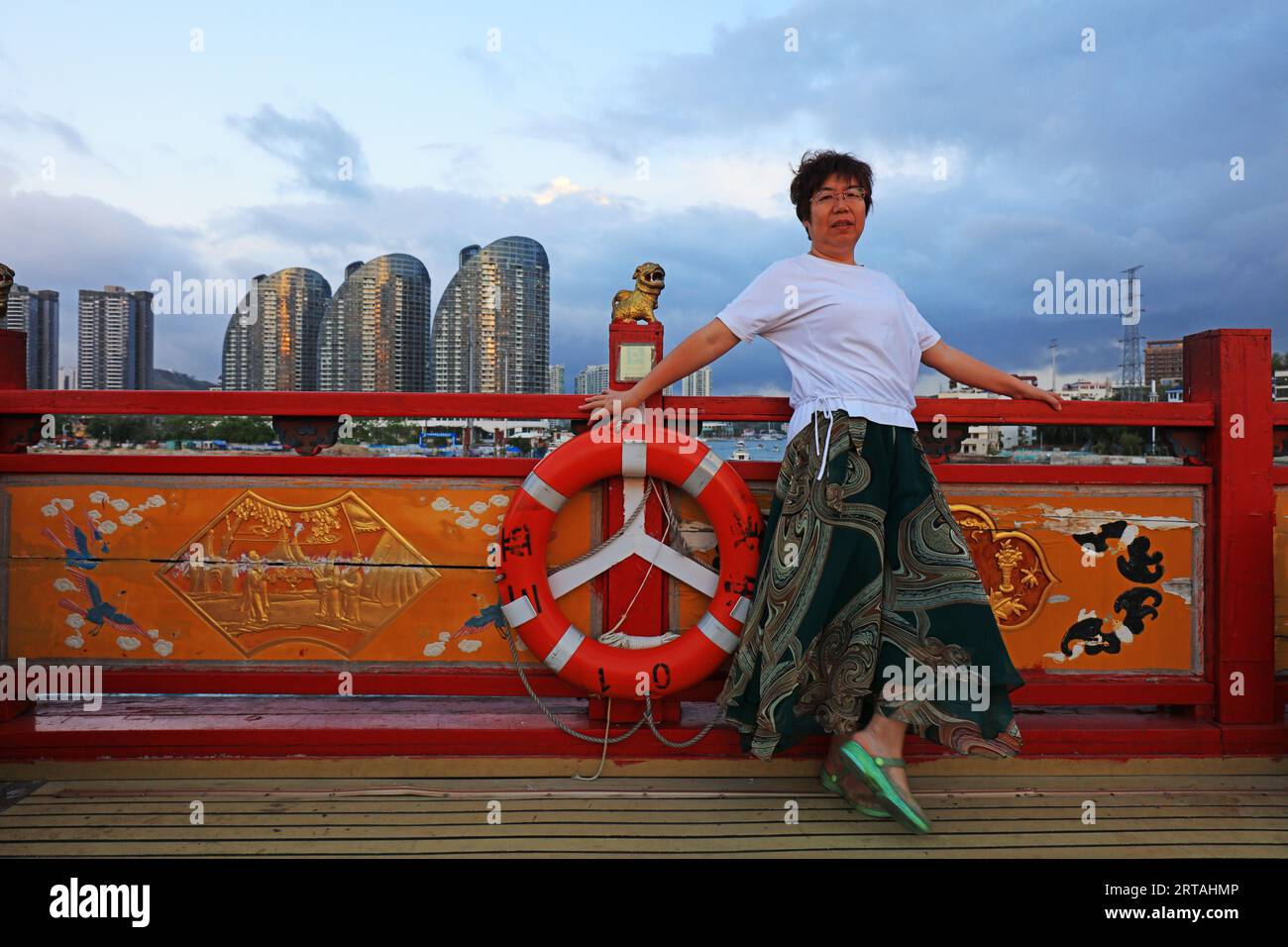 Sanya City, China - April 2nd, 2019: The lady is playing on the cruise ...