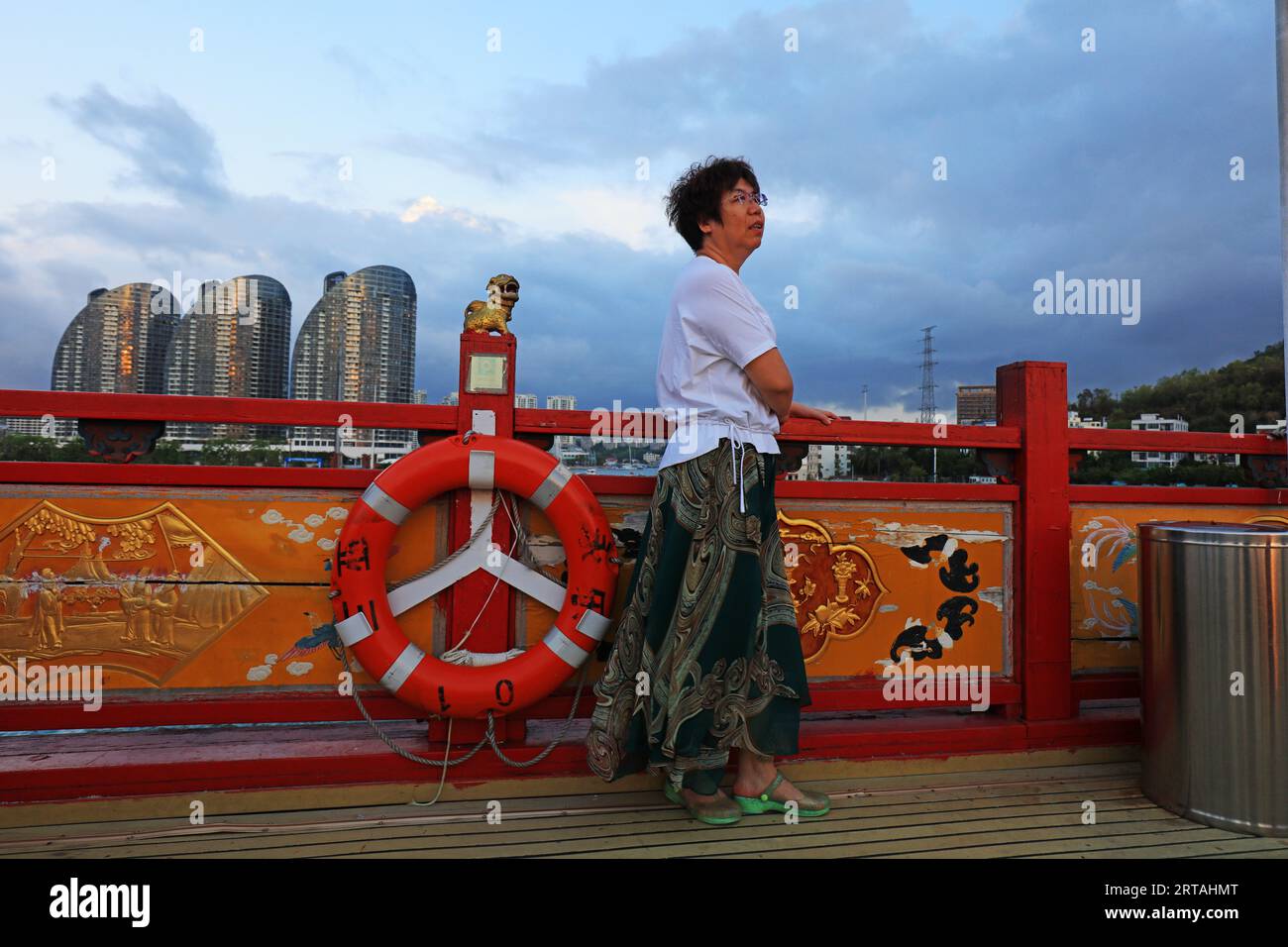 Lady with lifebuoy hi-res stock photography and images - Alamy