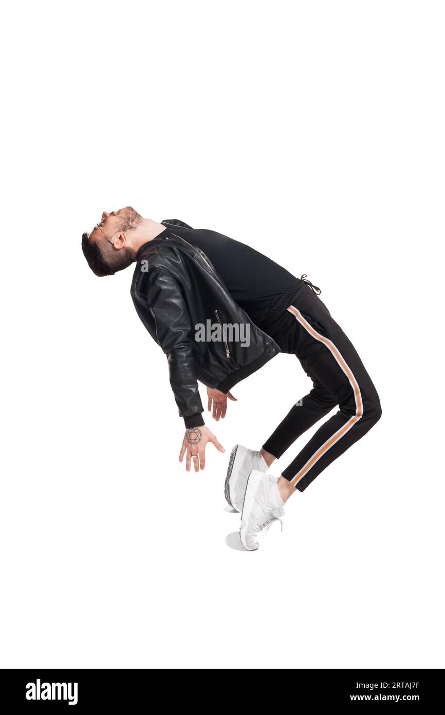 Full-length photo of a funny guy dancing in studio isolated on white ...