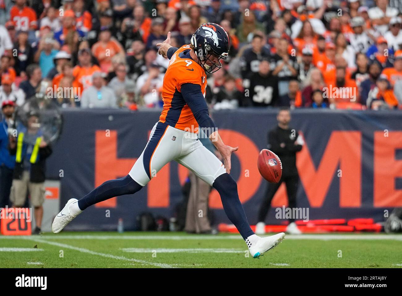 Denver Broncos punter Riley Dixon punts against the Las Vegas Raiders ...