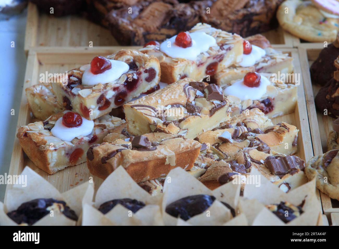 7th September 2023 Iced cakes on a market cake stall Stock Photo - Alamy