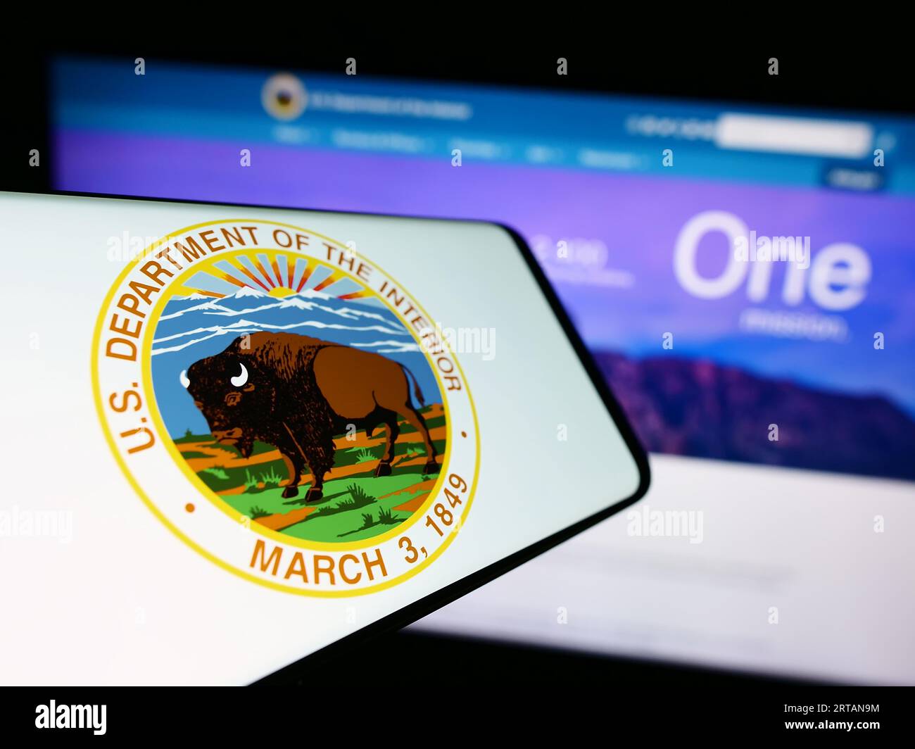 Mobile phone with seal of United States Department of the Interior (DOI ...