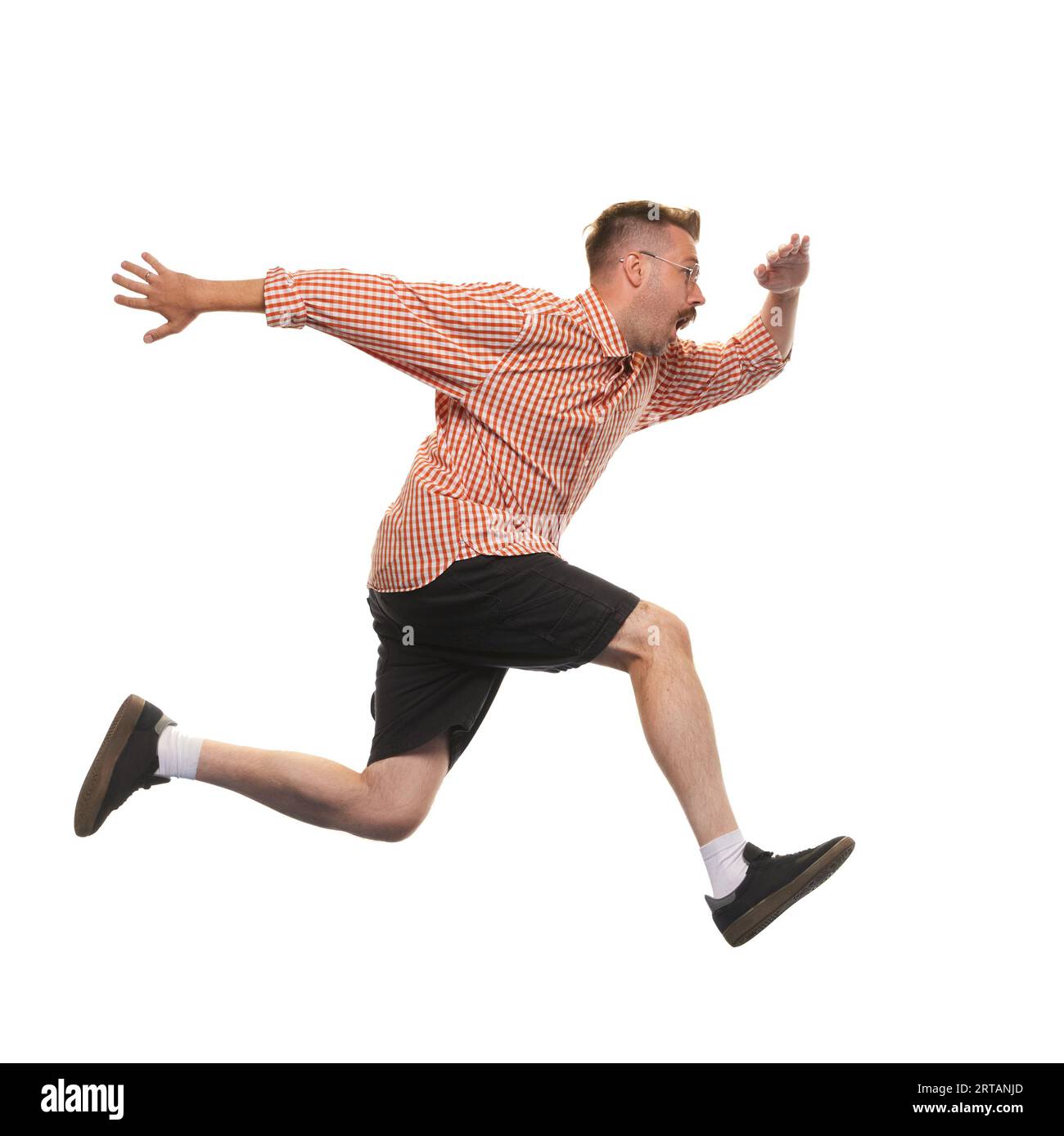 Stylish man running in a jump isolated on white background. Looking for ...