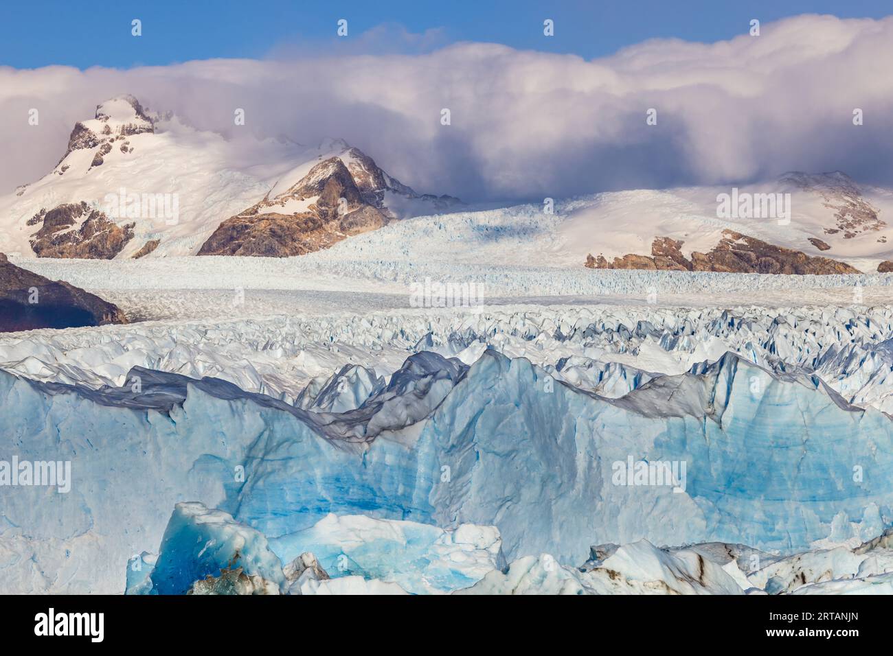 Forms and structures of blue shimmering ice at Perito Moreno Glacier ...