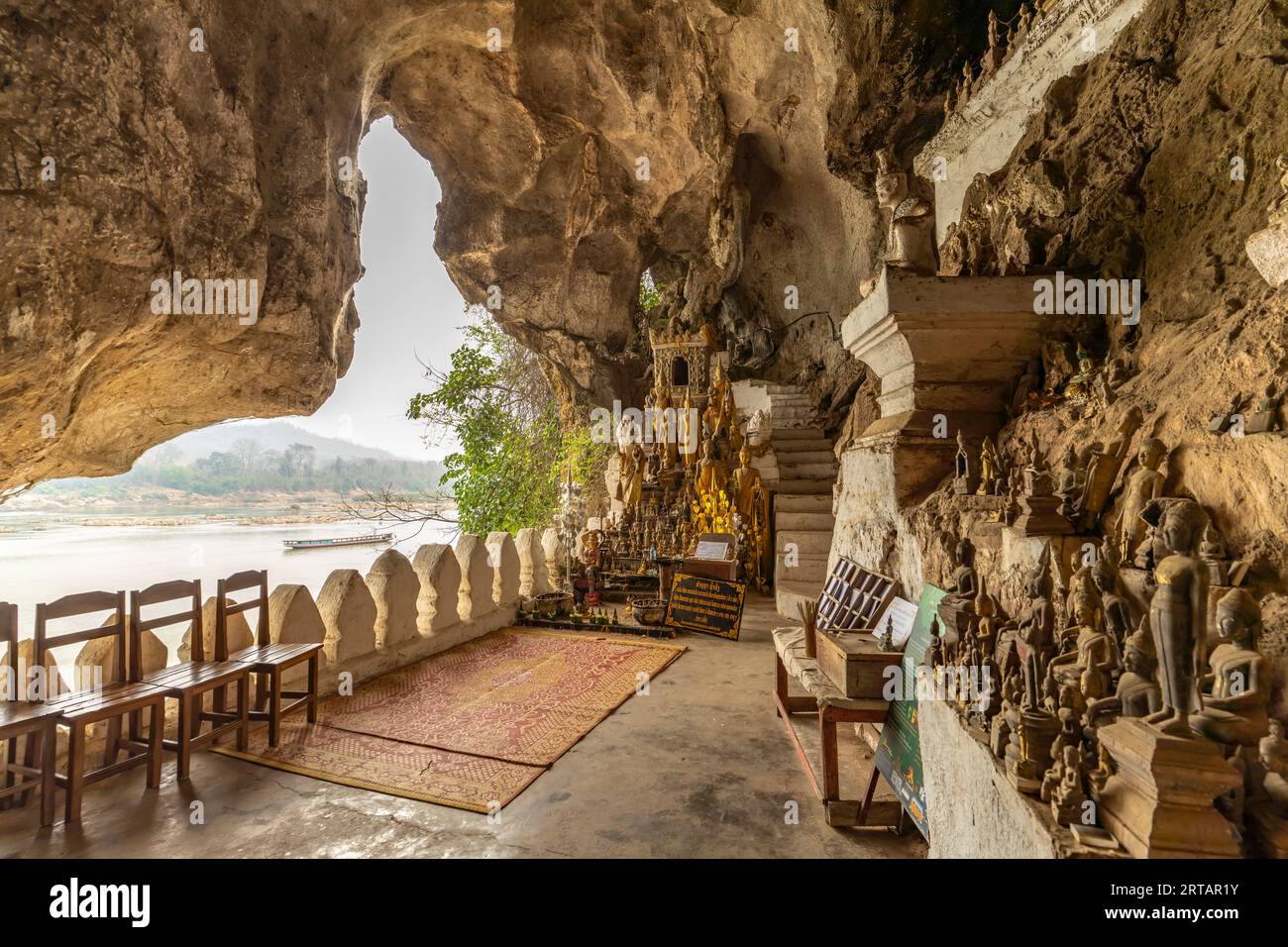 Buddha statues in the Pak Ou Caves at Luang Prabang, Laos, Asia Stock ...