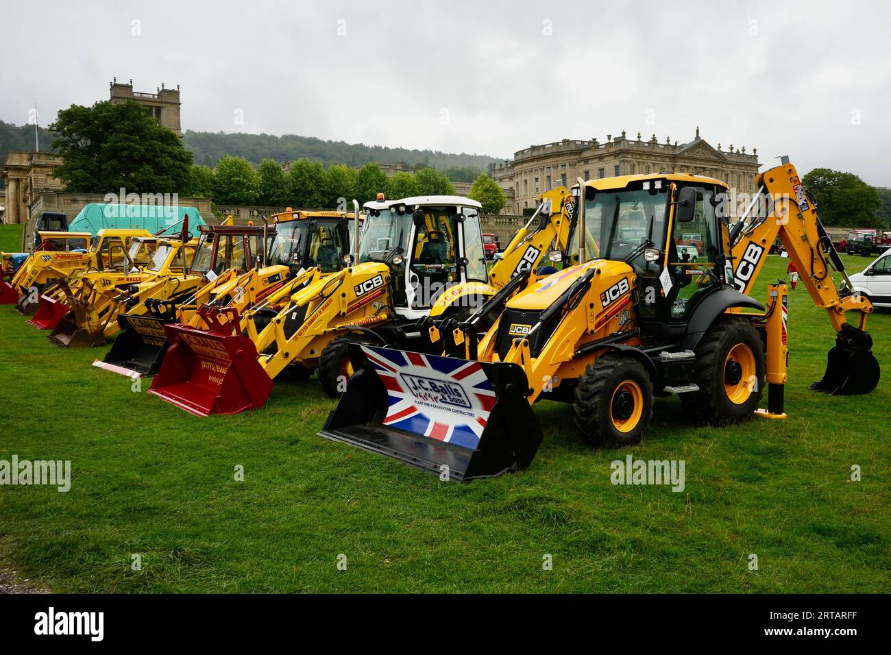 A line up of Yellow JCB Diggers Stock Photo - Alamy