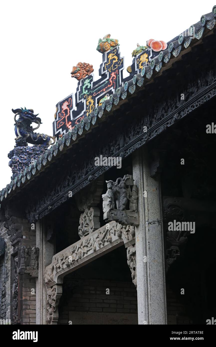 Stone carvings adorn columns in an ancestral hall in Guangzhou, China ...