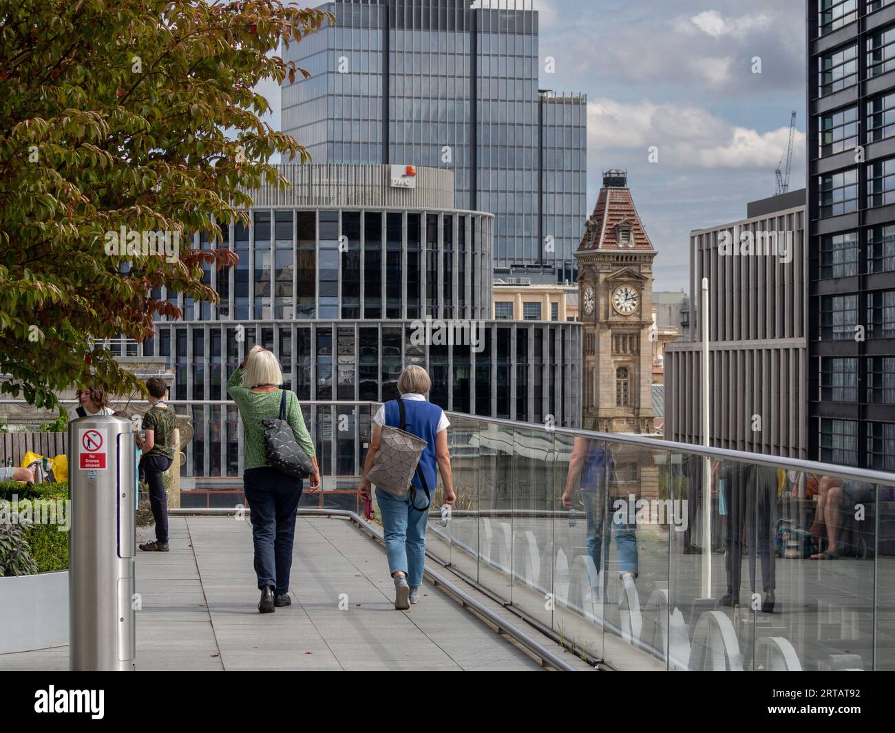 Visitors to the terrace at the Library of Birmingham taking in views of ...