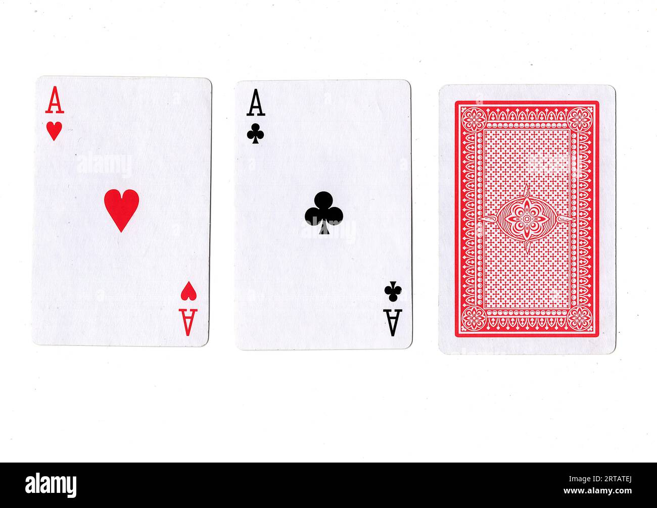 A hand of three playing cards revealing two aces on a white background ...
