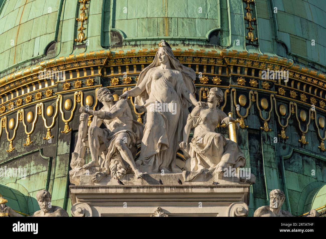Statues on the dome of the Michaelertrakt of the Hofburg in Vienna ...