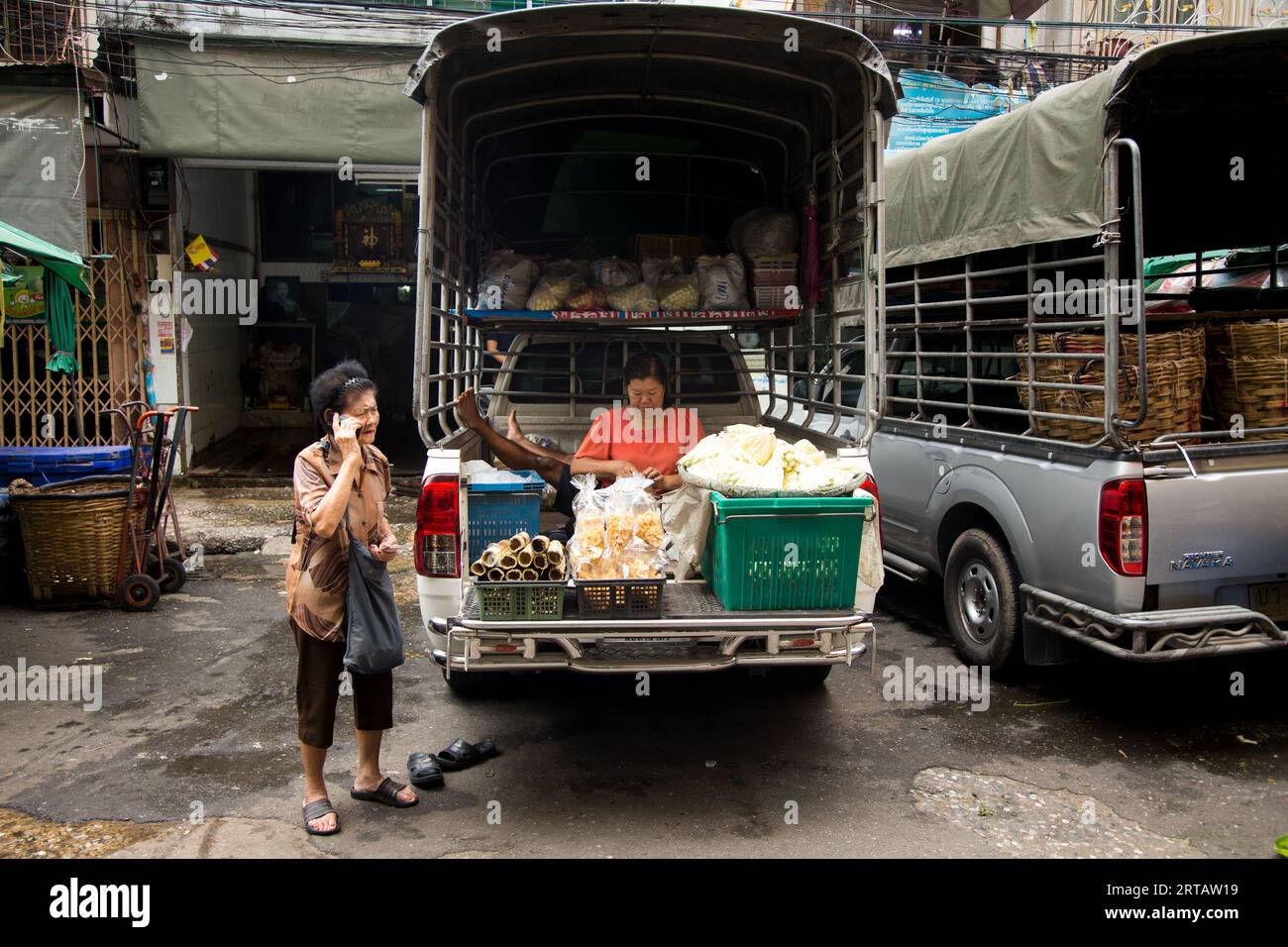 Bangkok, Thailand; 1st January 2023: Woman selling food in the back of ...