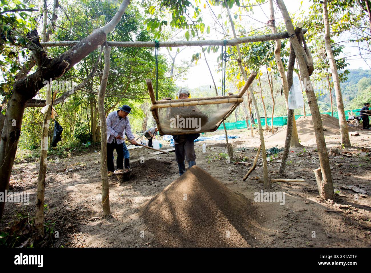 Chiang Mai, Thailand; 1st January 2023: Man filtering soil at an ...