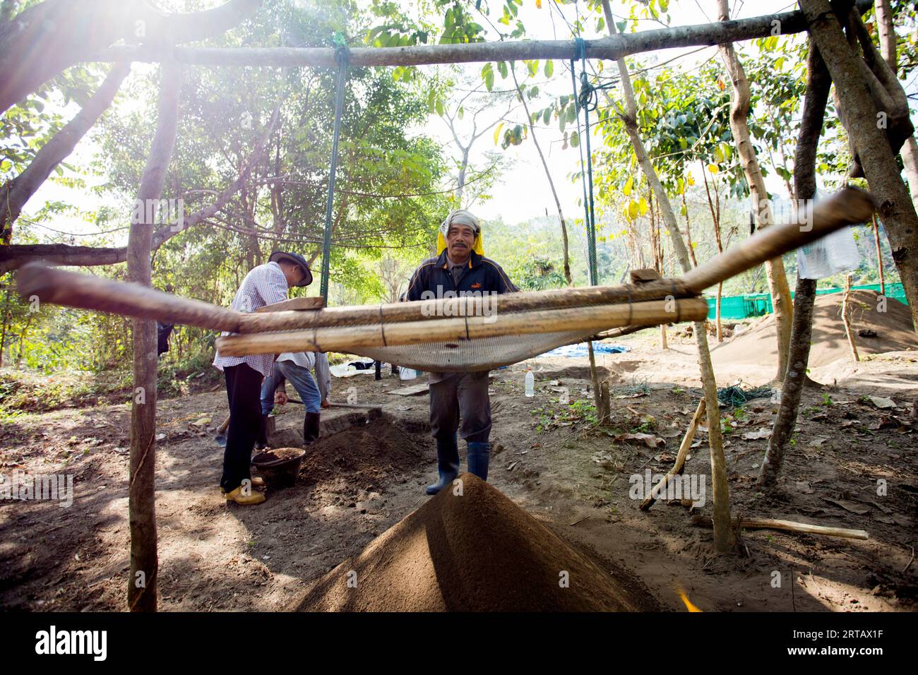 Chiang Mai, Thailand; 1st January 2023: Man filtering soil at an ...