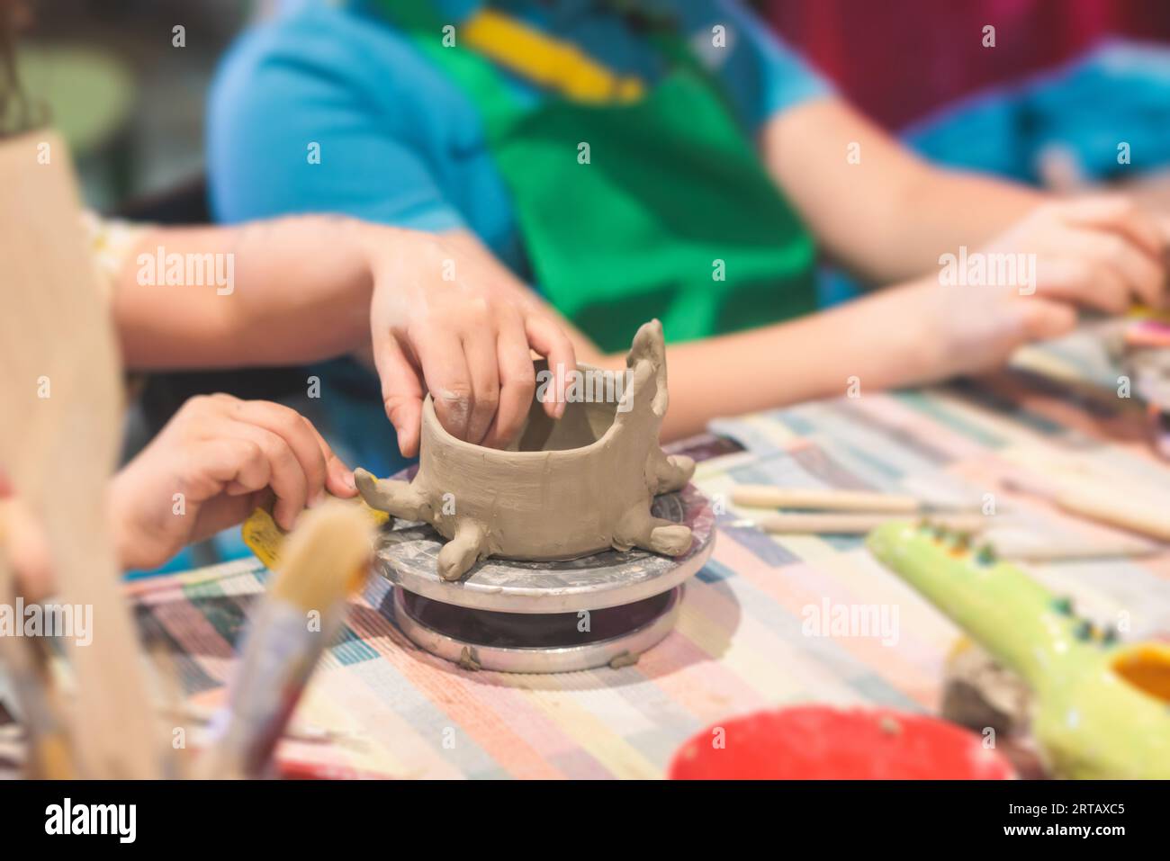 Pottery lesson master class for kids children, process of making clay ...