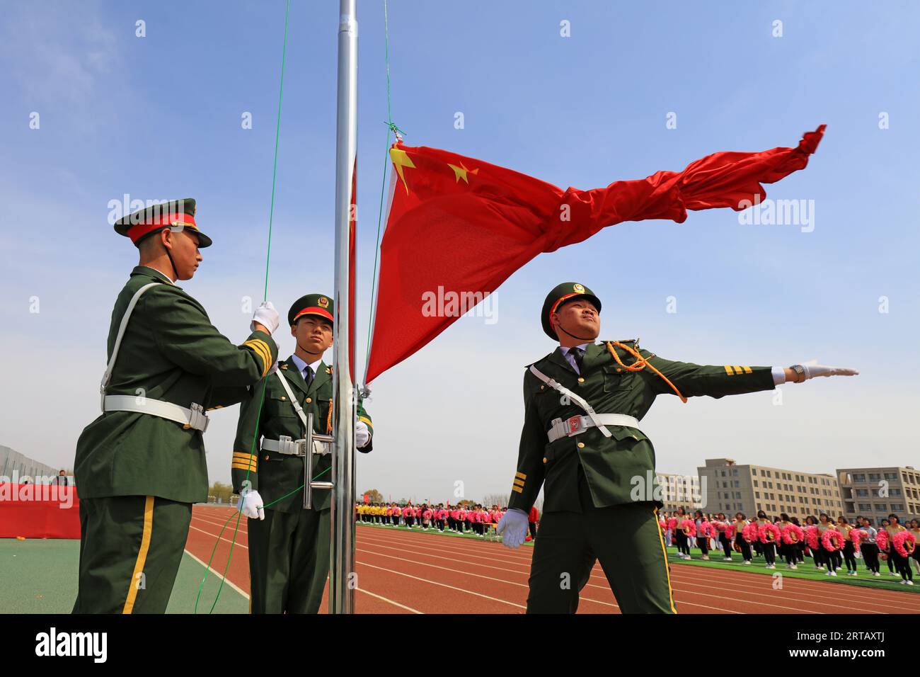 Flag raising ceremony china hi-res stock photography and images - Alamy