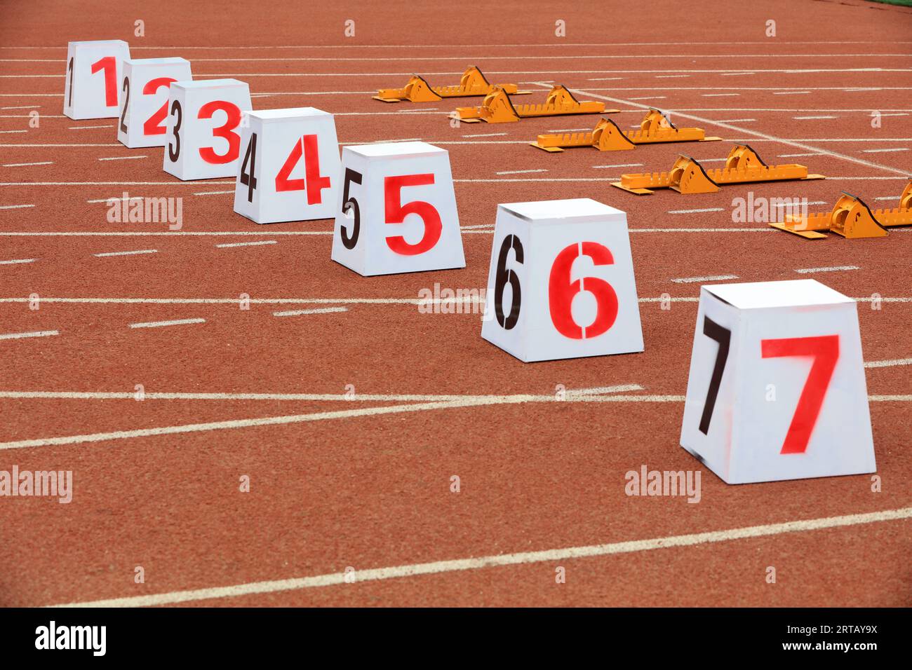 Track numbers and starters on the plastic track on the playground Stock ...