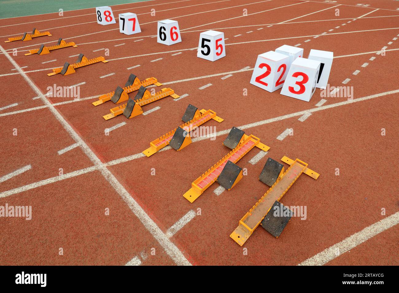 Track numbers and starters on the plastic track on the playground Stock ...