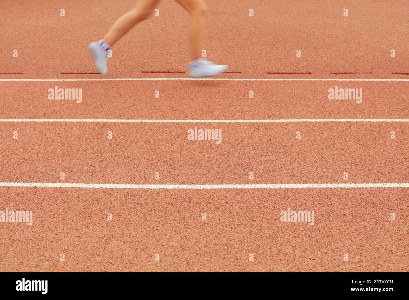 Long distance runners are running on the track Stock Photo - Alamy