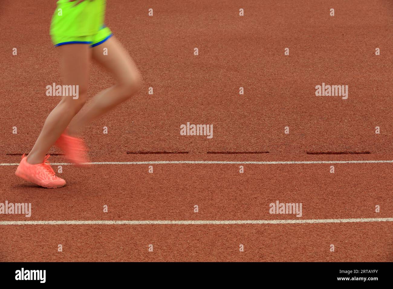 Long distance runners are running on the track Stock Photo - Alamy