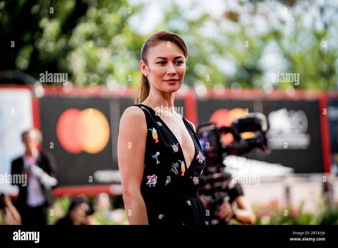 VENICE, ITALY - AUGUST 31: Ramzy Bedia, Xavier Giannoli, Olga Kurylenko ...