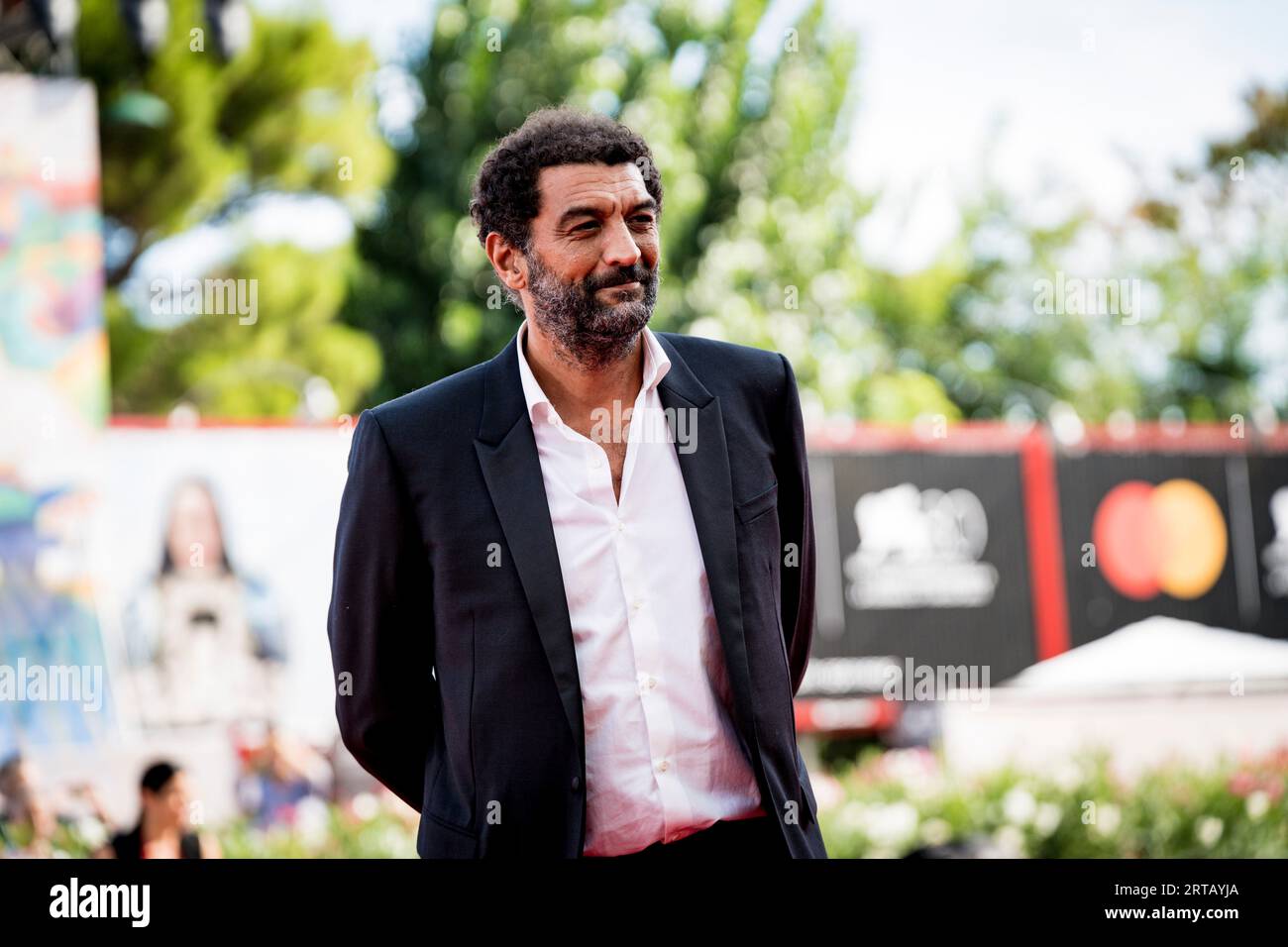 VENICE, ITALY - AUGUST 31: Ramzy Bedia, Xavier Giannoli, Olga Kurylenko ...