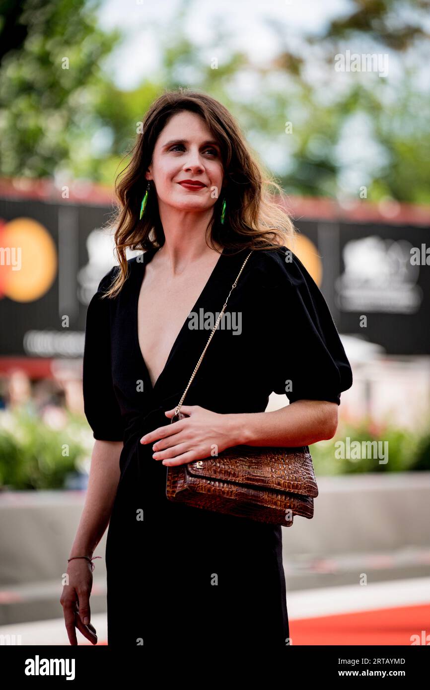 VENICE, ITALY - AUGUST 31: Ramzy Bedia, Xavier Giannoli, Olga Kurylenko ...