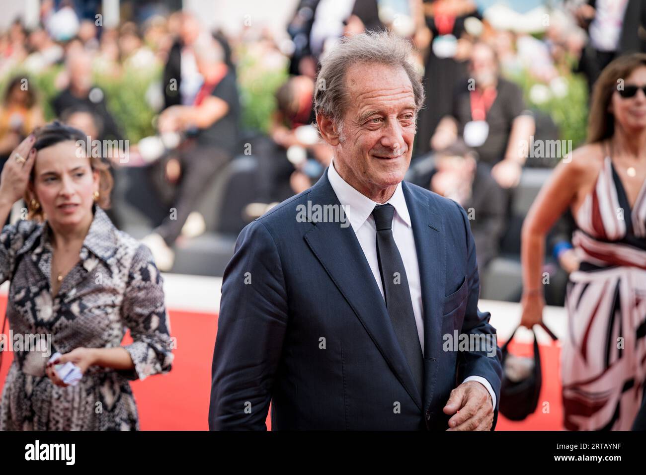 VENICE, ITALY - AUGUST 31: Ramzy Bedia, Xavier Giannoli, Olga Kurylenko ...
