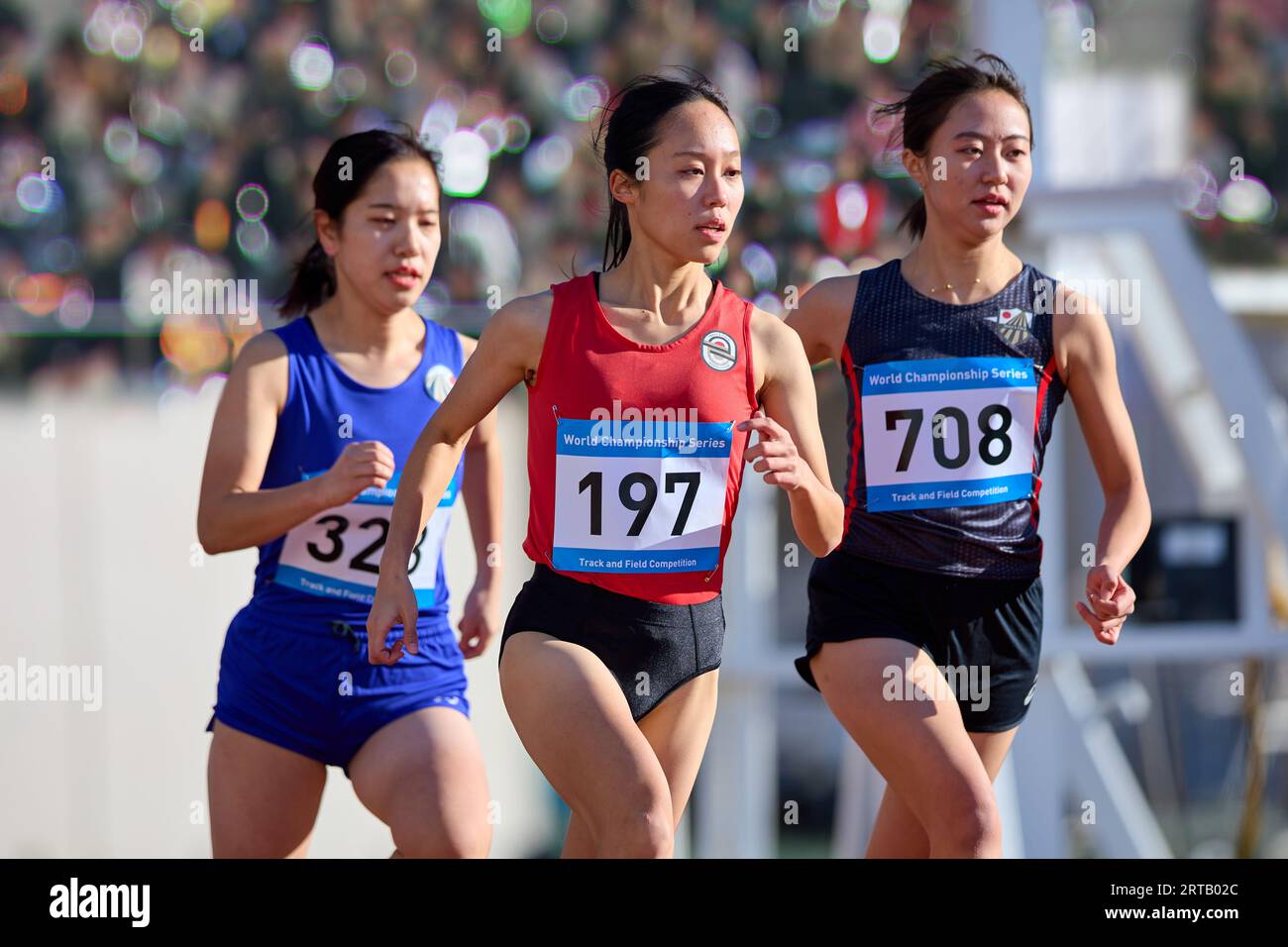 Japanese athletes running on track Stock Photo - Alamy